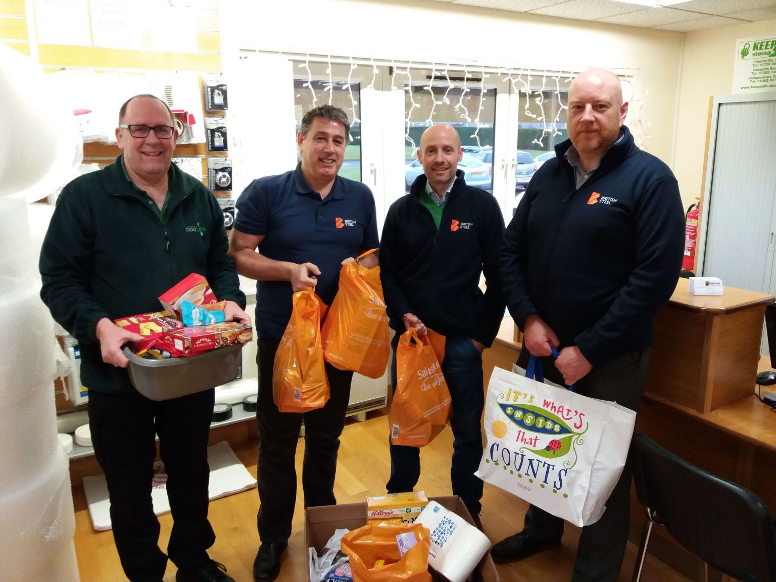 British Steel employees hand over collections to their local foodbanks ...